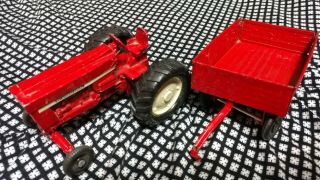 ERTL - Vintage Red International Tractor And Red Toy Trailer. | #9809401